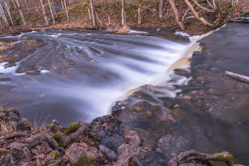 Waterfall in Several Stages and Fallen Leaves Stock Image - Image of ...