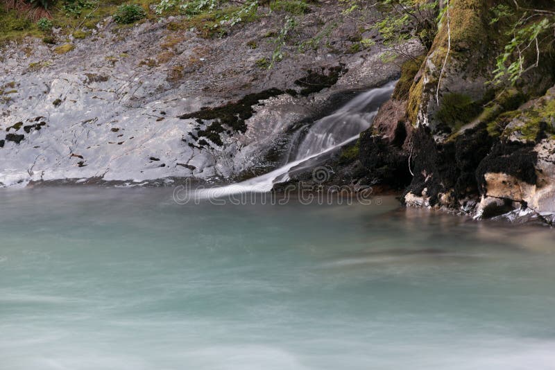 Waterfall Sliding into a River Stock Image - Image of sliding, long ...