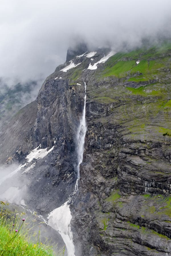 Waterfall from the Slopes of the Eiger Falling into the ...