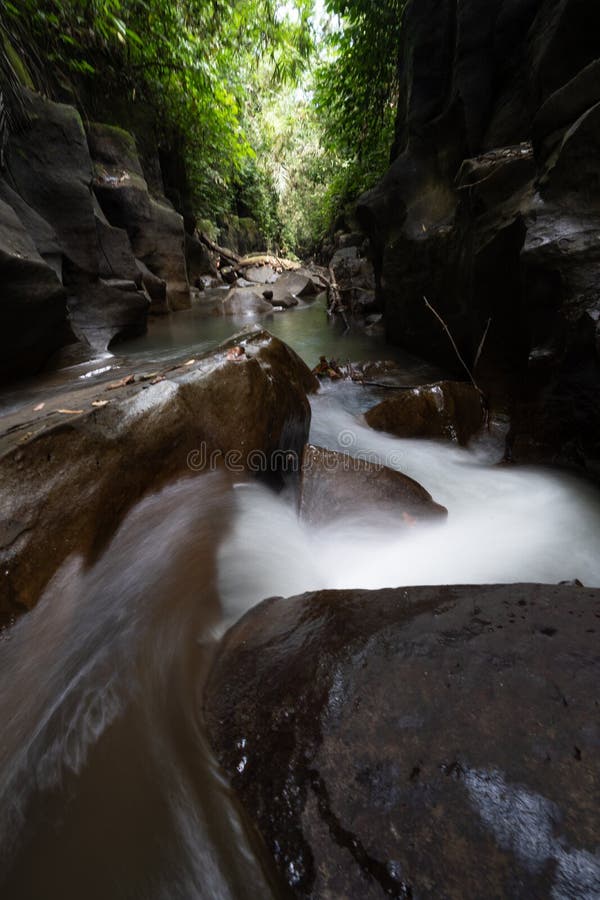 Waterfall smooth flow stock image. Image of forest, natural - 184133813