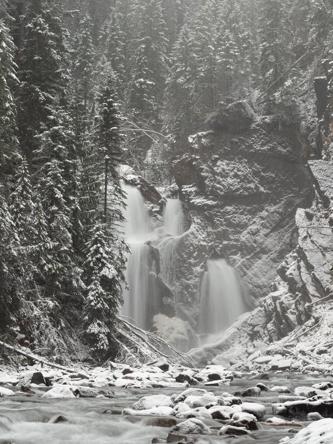 Waterfall in snow stock image. Image of snowing, rocks - 235081105