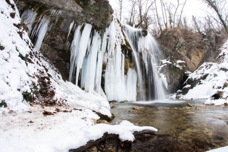 Waterfall in the snow stock photo. Image of stream, natural - 212344718