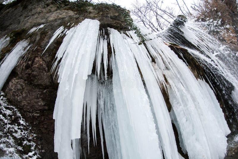 Waterfall in the snow stock image. Image of landmark - 218332973