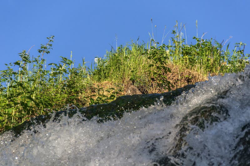 Waterfall stream grass stock photo. Image of stones, blur - 41870492