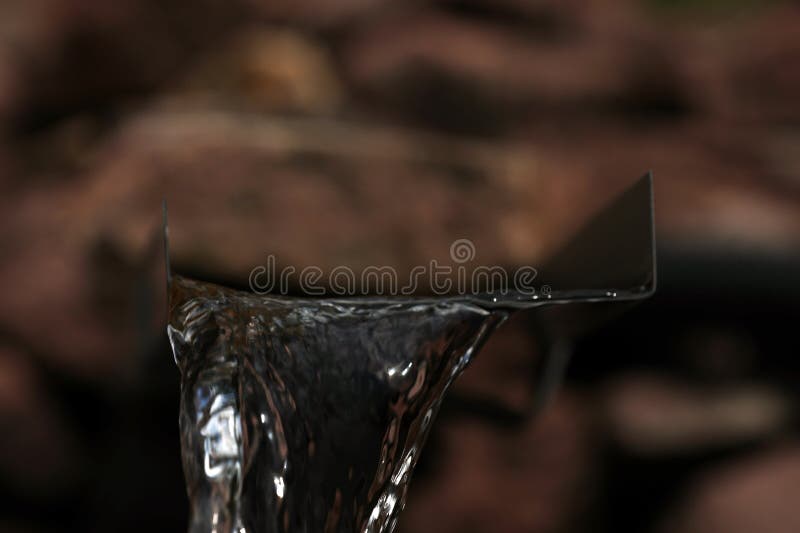 A Stream of Hot Metal, Molten Steel Flowing Along a Guide Chute. Stock ...