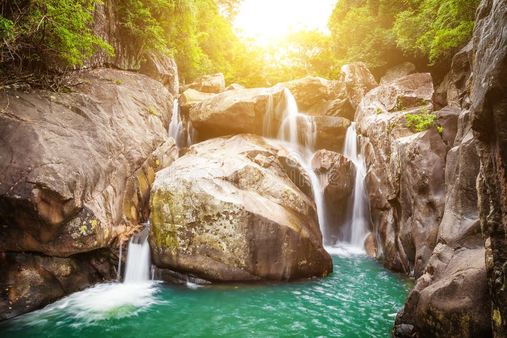 Waterfall and sun stock photo. Image of forest, beauty - 29552050