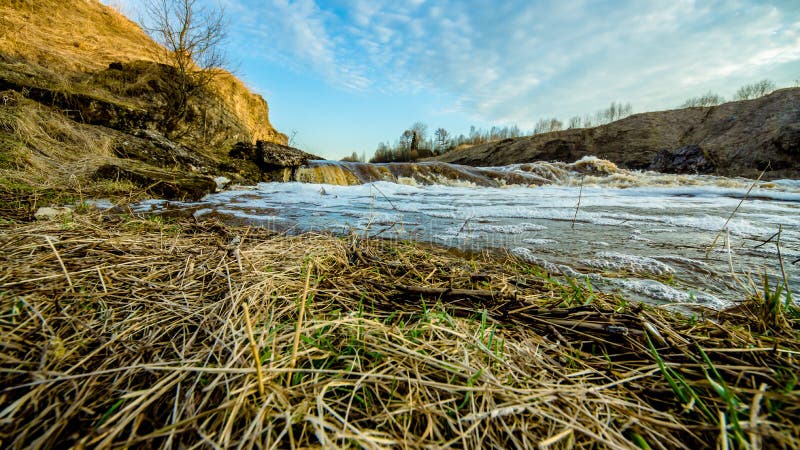 Waterfall in sun lights stock image. Image of scarf - 115493757