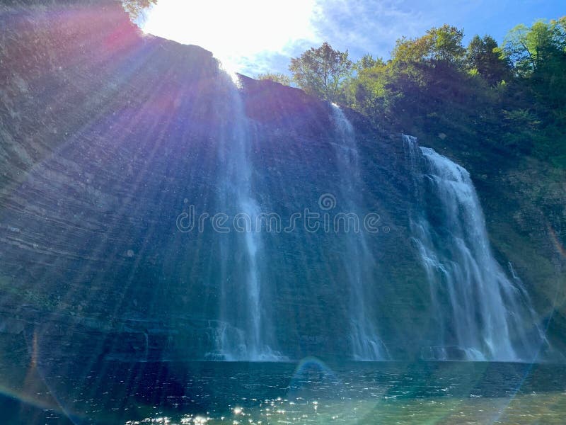 Waterfall with Sun Rays stock image. Image of natural - 368567917