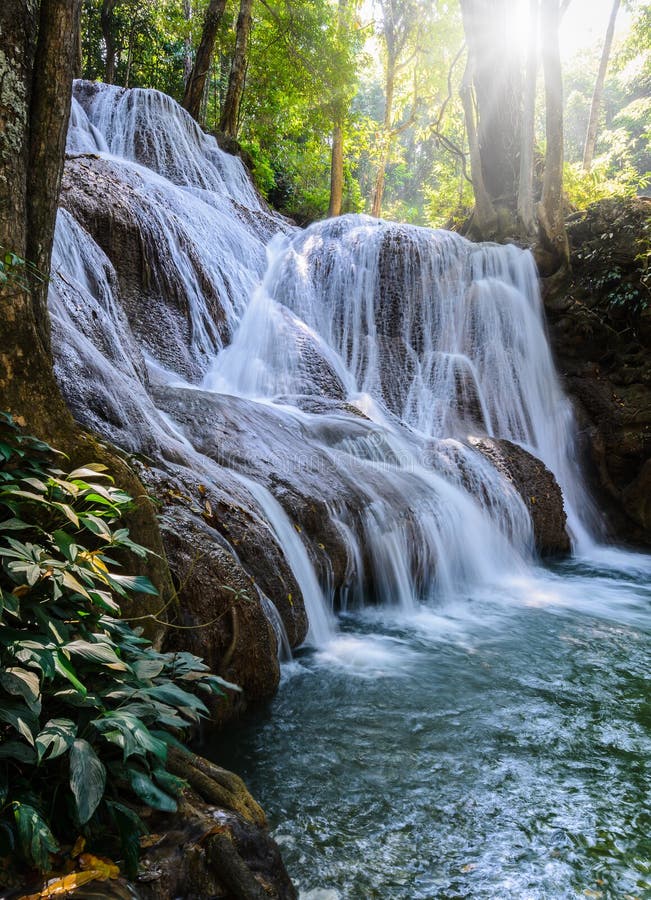 Waterfall and sunshine. stock photo. Image of fresh, flowing - 86116620
