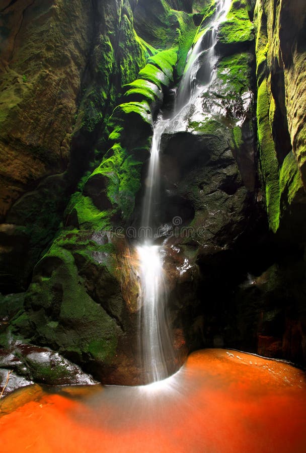 Rock arch and waterfall stock image. Image of cascading - 1442169