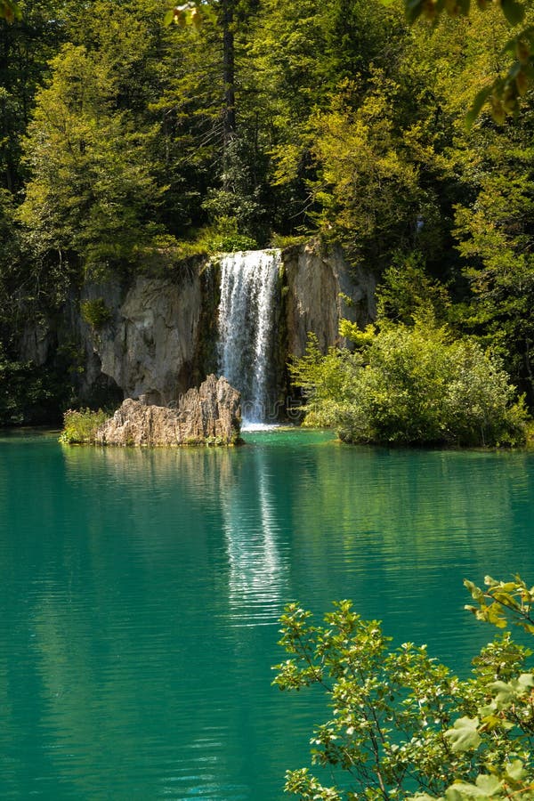 Waterfall To the Turquoise Lake Stock Image - Image of beach, beauty ...