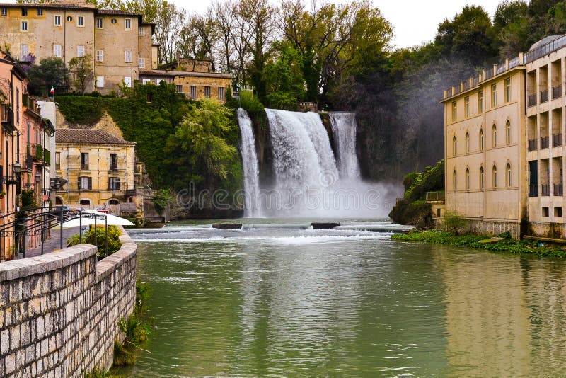 Waterfall in the town stock photo. Image of falls, nature - 116757516