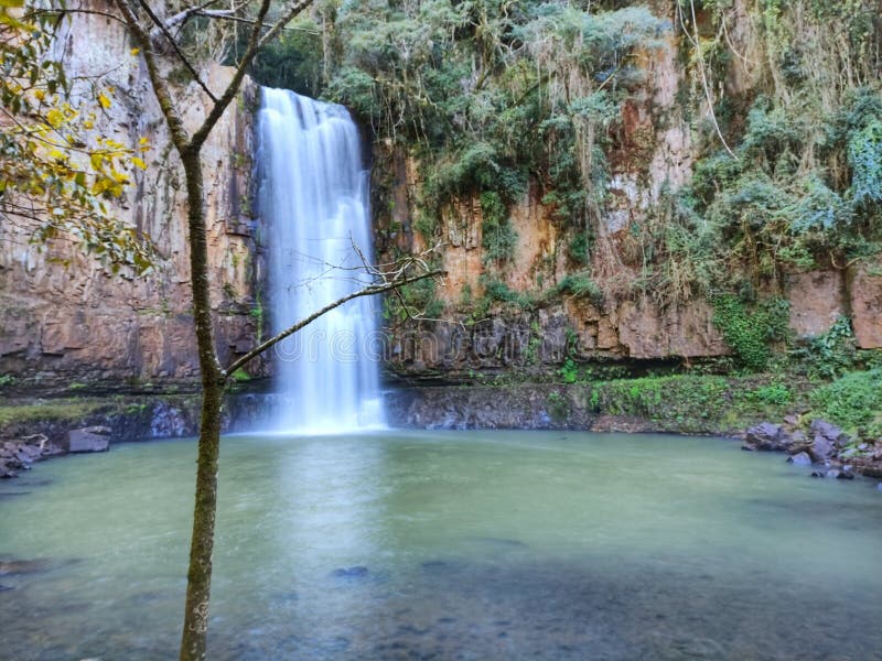 Waterfall through the Trees Stock Image - Image of stone, river: 1390993