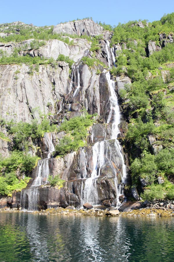 Waterfall of Trollfjord stock image. Image of clouds - 22203801