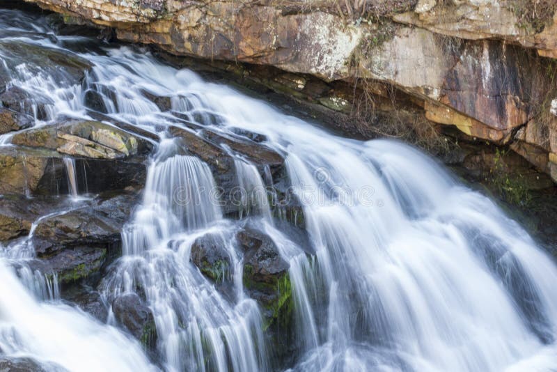 A Waterfall Under a Rock Ledge Stock Image - Image of alabama, overhang ...
