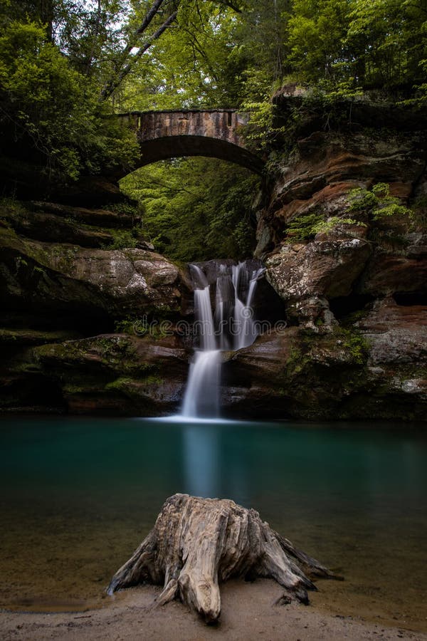 Waterfall Under a Stone Bridge in Hocking Hills, Ohio Stock Photo ...