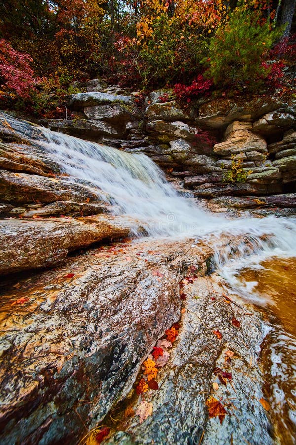 Waterfall Up Close with Exposed Rocks and Fall Leaves Stock Photo ...