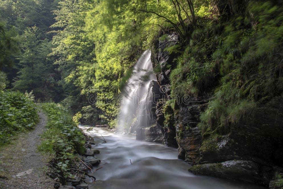 Waterfall in the Valley of the Jiet River,Romania Stock Photo - Image ...