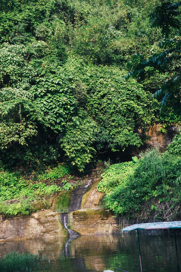 A Waterfall View from Far with Lake Stock Image - Image of vegetation ...