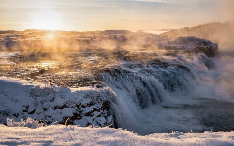 Waterfall at Winter Dawn on a Cold Winter Morning in Iceland Stock ...
