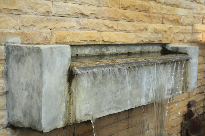 Waterfalls Flow from the Wall Stock Image - Image of surface, garden ...