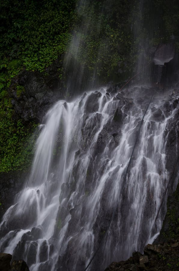 Waterfalls stock image. Image of hill, greenery, located - 75636157
