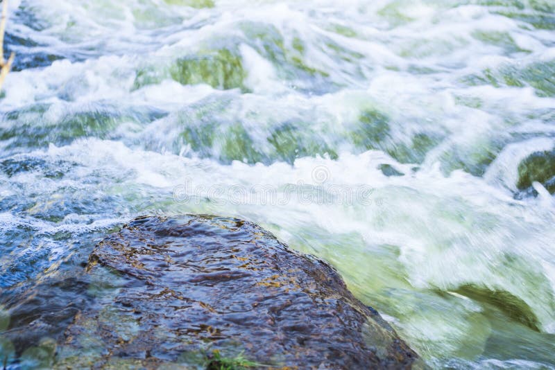 Waterflow. Water Flowing Over the Rock Stock Image - Image of flowing ...