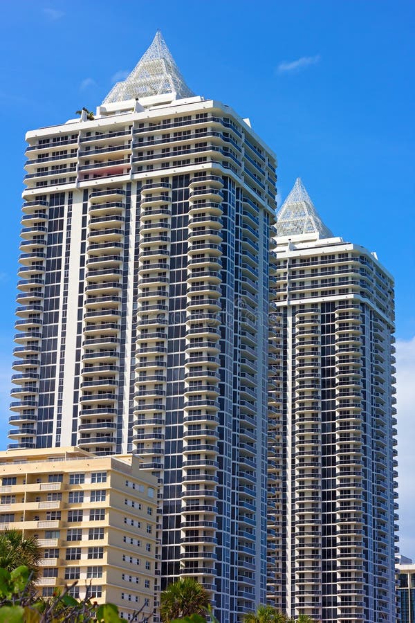Waterfront Buildings, Palms and Blue Sky. Stock Image - Image of beach ...