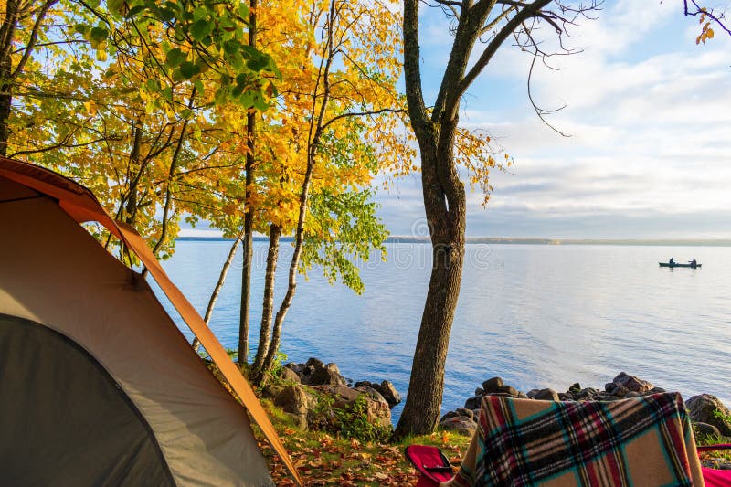Waterfront Campsite on an Autumn Morning Stock Image - Image of blurred ...