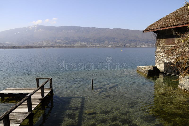 Waterfront stone house stock photo. Image of menthon - 23896220