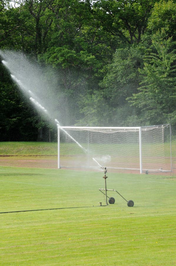 Watering stock image. Image of football, field, watering - 21048981