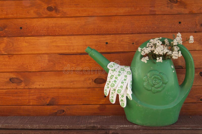 Watering Can on Background Texture Stock Image - Image of spring, color ...