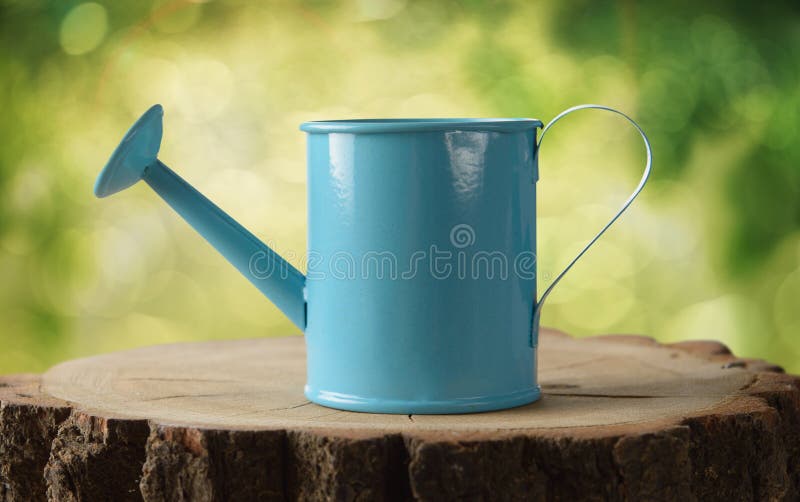 Watering can stock photo. Image of background, rusty - 144341354