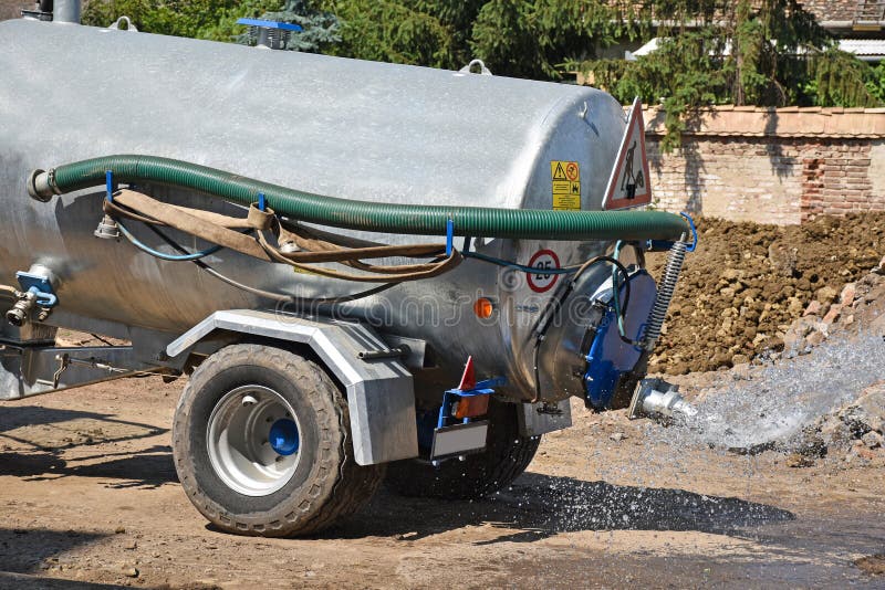 Watering Container at the Road Construction Site Stock Image - Image of ...