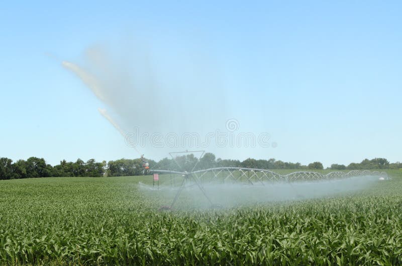 Irrigating Farm Field stock photo. Image of watering - 33125970