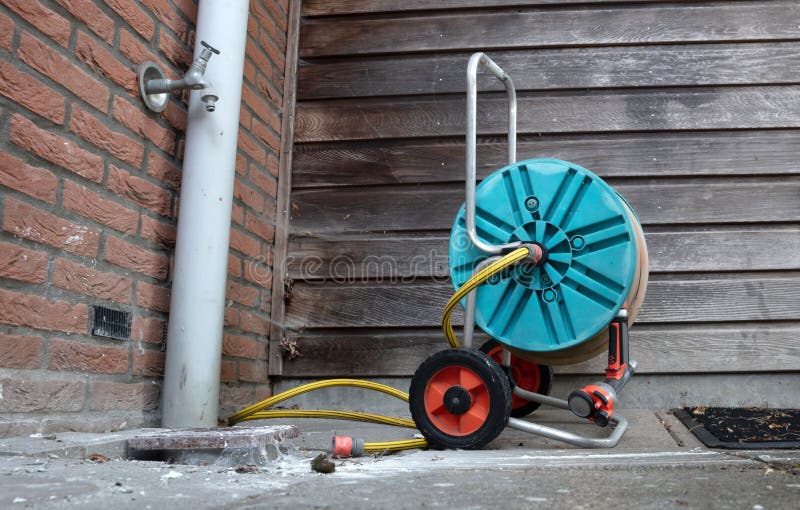 Watering Garden Hose on the Spool Stock Image - Image of tool, copy ...