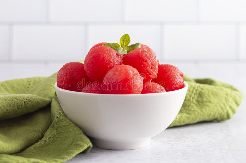 Watermelon Balls on a White Kitchen Cabinet Stock Photo - Image of ...