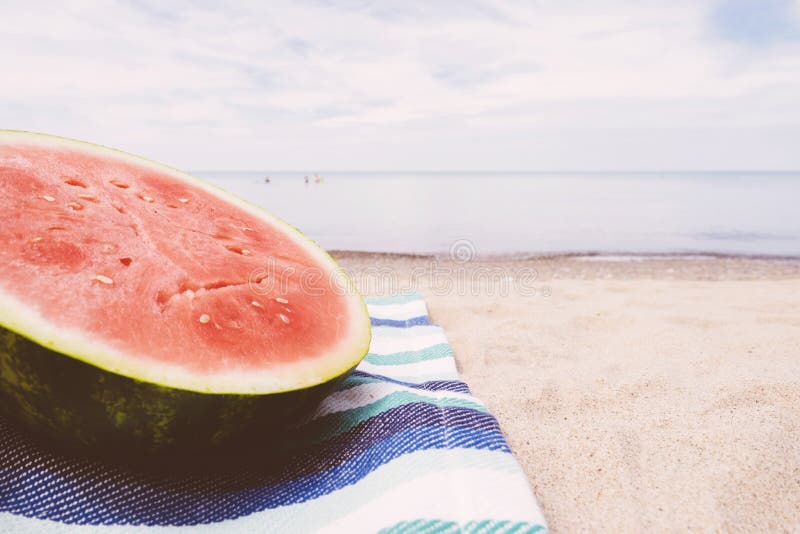Watermelon on beach stock photo. Image of watermelon - 83061814