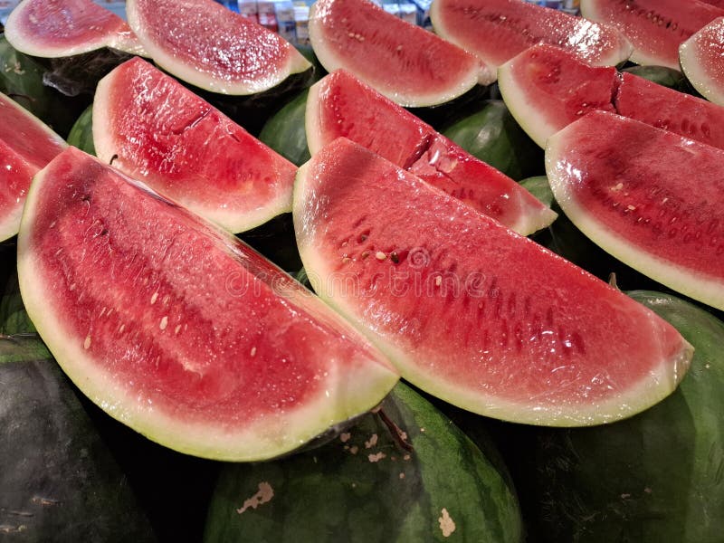 Watermelon Cut in Plastic Wrap Stock Photo - Image of plastic, store ...