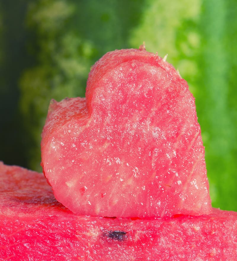 Watermelon in heart shape stock image. Image of slice - 32949483
