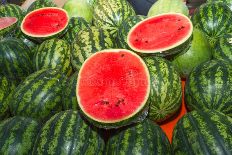 Watermelon on an Open Air Market Stand Stock Photo - Image of sliced ...