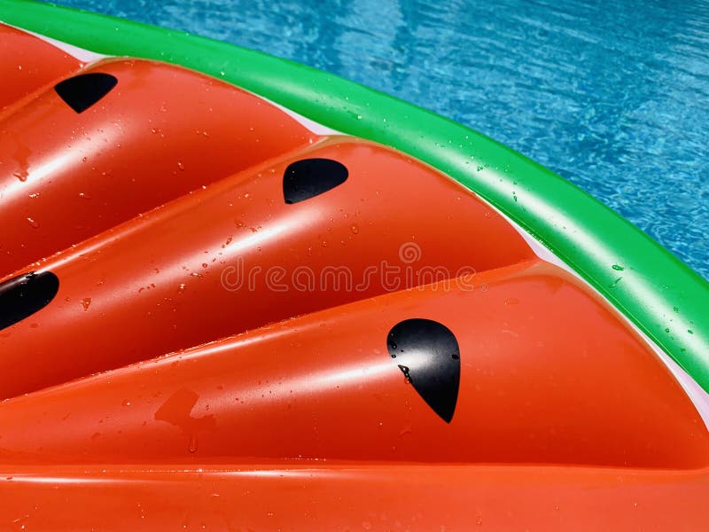 Watermelon Pool Float, Part of Ring Floating in a Refreshing Blue ...