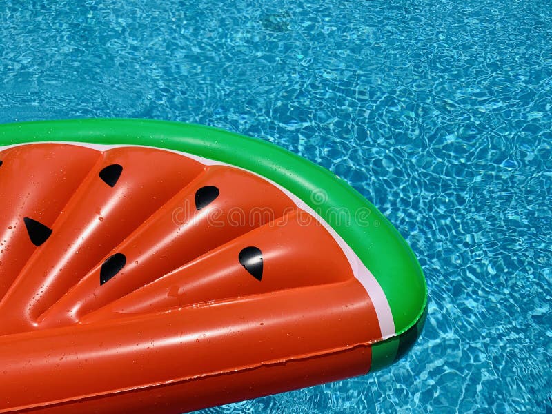 Watermelon Pool Float, Part of Ring Floating in a Refreshing Blue ...