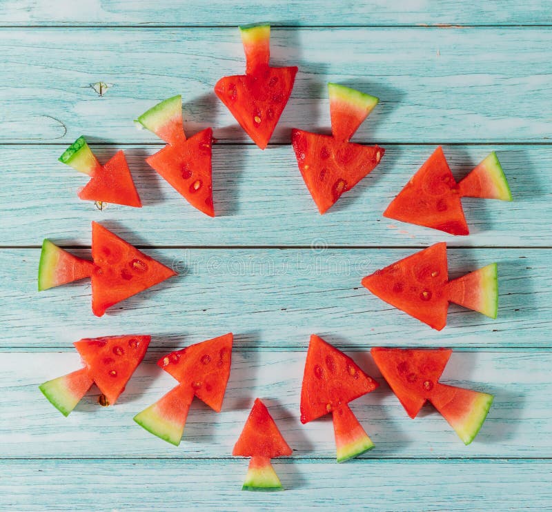 A Watermelon in the Shape of an Arrow Directed To the Center in a Close ...
