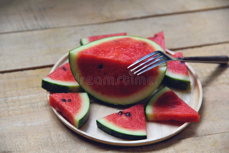 Watermelon Slice on Wooden Plate Stock Photo - Image of green, isolated ...