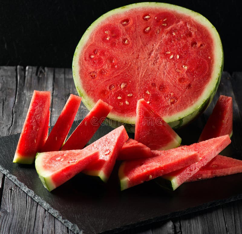 Watermelon slices stock image. Image of eating, wooden - 56164047