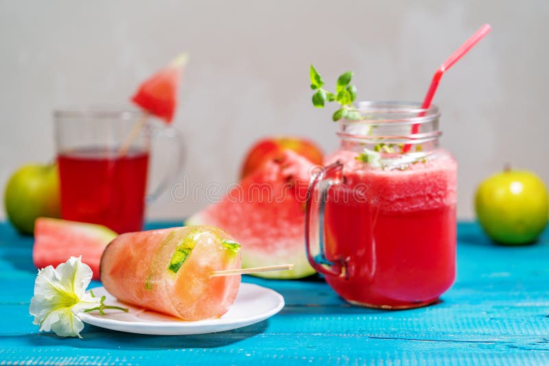 Watermelon Smoothie in a Glass Glass Next To Fruit Ice Stock Photo ...