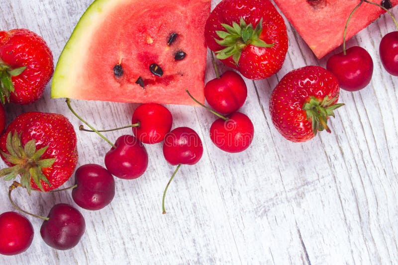 Watermelon, Strawberries and Cherries on Wooden Background. Stock Photo ...