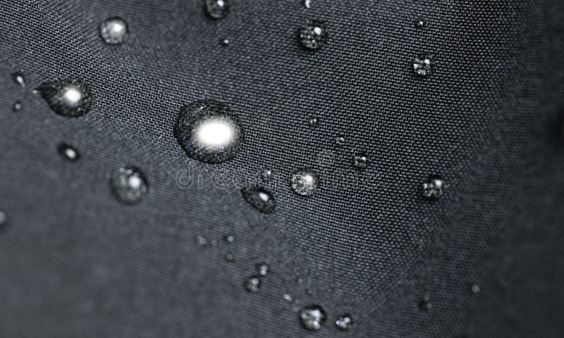 Waterproof Fabric Clothing with Water Drops Stock Image - Image of ...