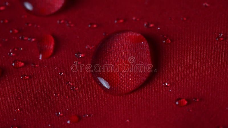 Waterproof Textile Cloth Concept. Rain, Water Drops are Splashing on ...